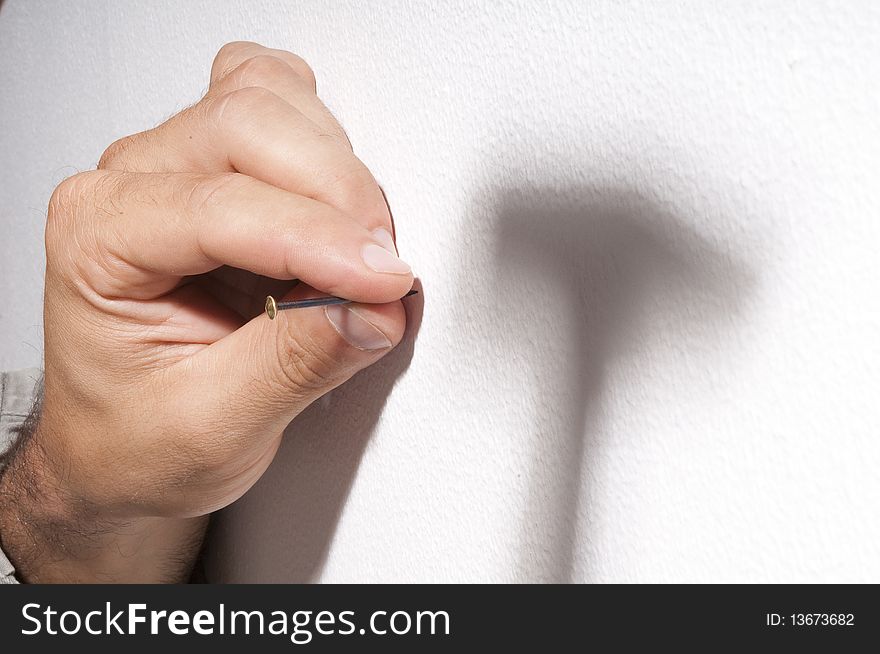 1+ Male hand driving nail wall Free Stock Photos - StockFreeImages